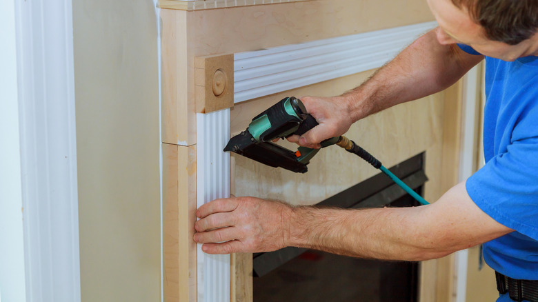 Bring a modern touch to your living room with this sleek fireplace trend