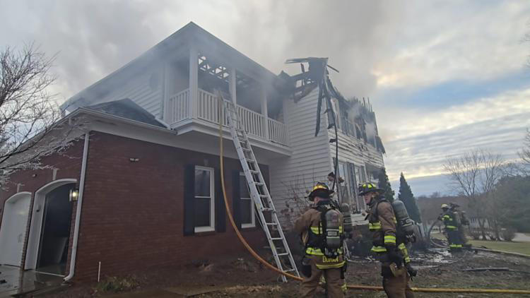 Firefighter taken to hospital after partially falling through floor ...