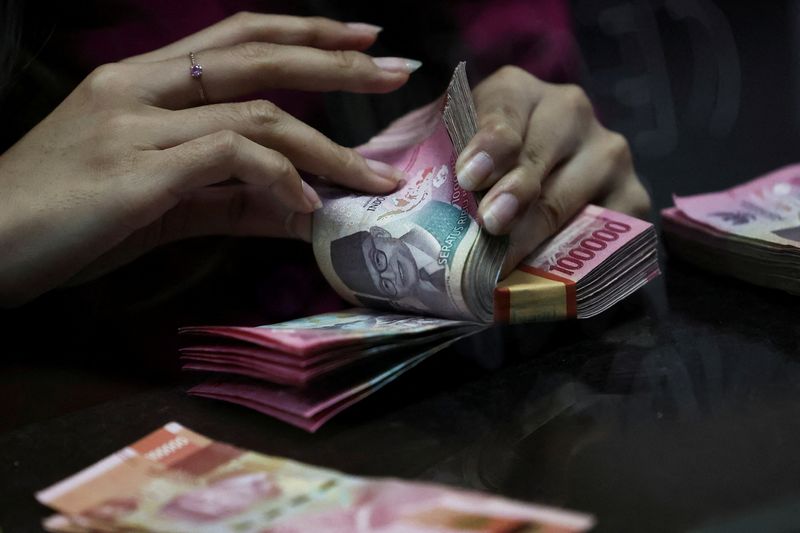 Bank Indonesia to hold rates again as rupiah currency remains weak ...