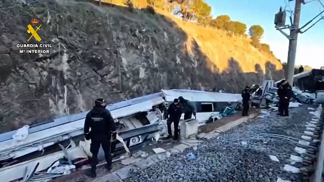 Spanish emergency services rush to wreckage of deadly train derailment