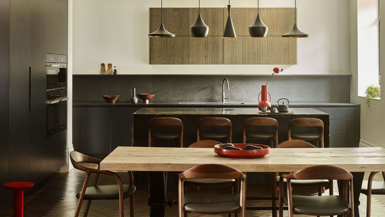 This basement kitchen's 'unexpected' pantry door detail makes it feel ...