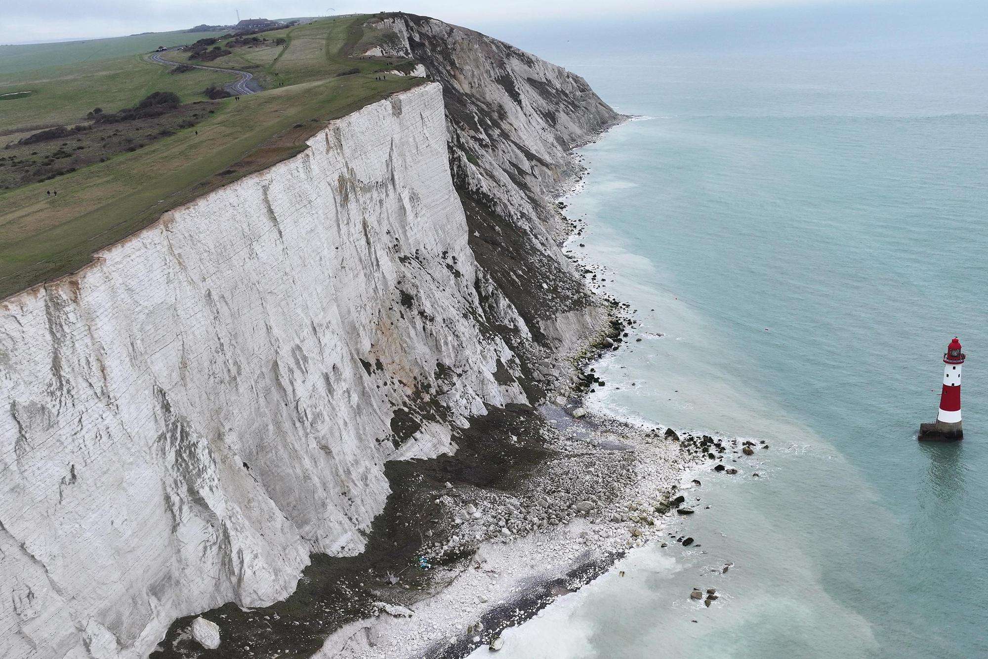 Aerial photos show shipping container washed up at Beachy Head