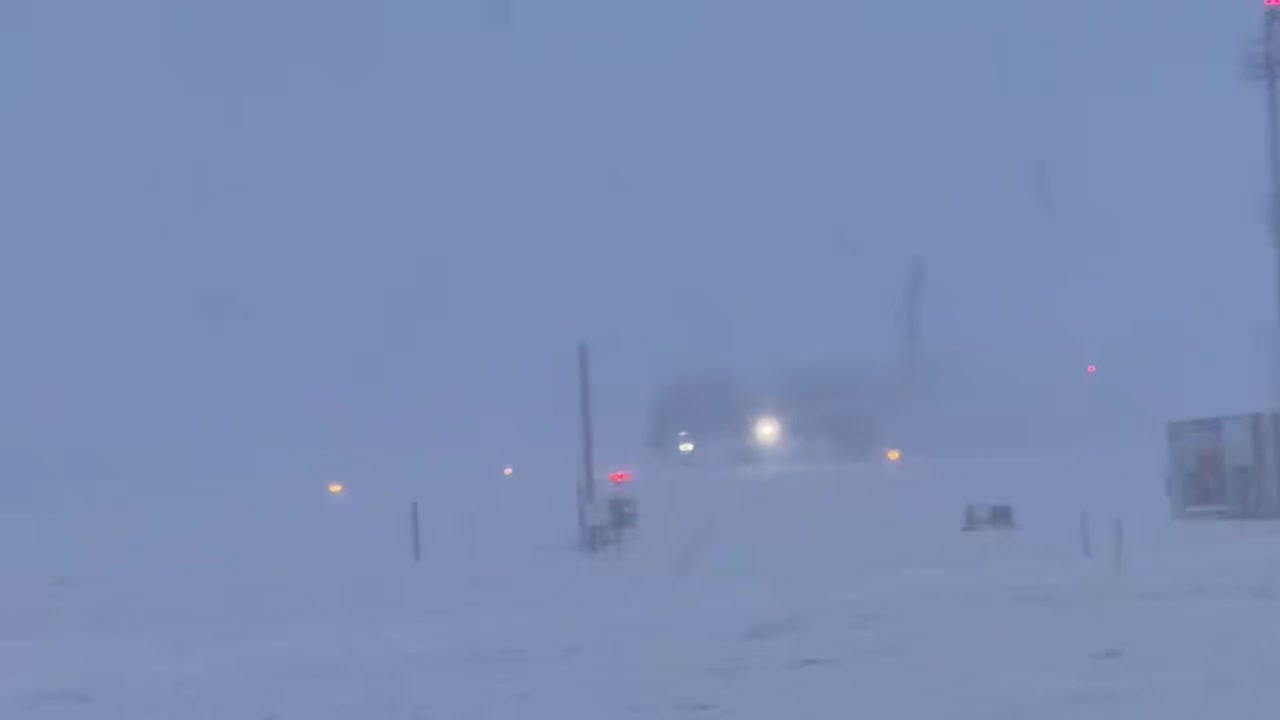 Planes take off through heavy snow at airport in New York