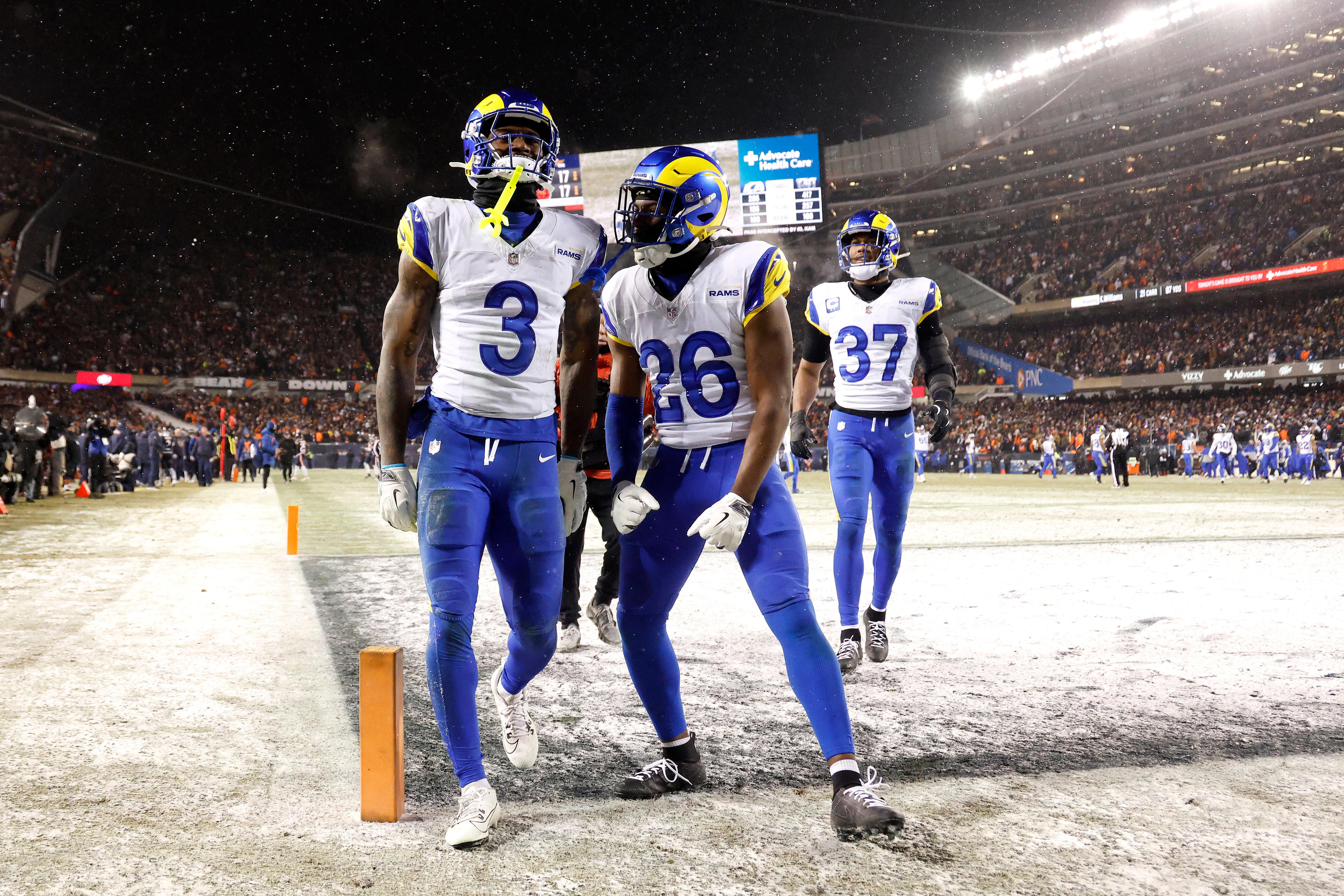 Rams players show off their cayenne pepper stained socks after win
