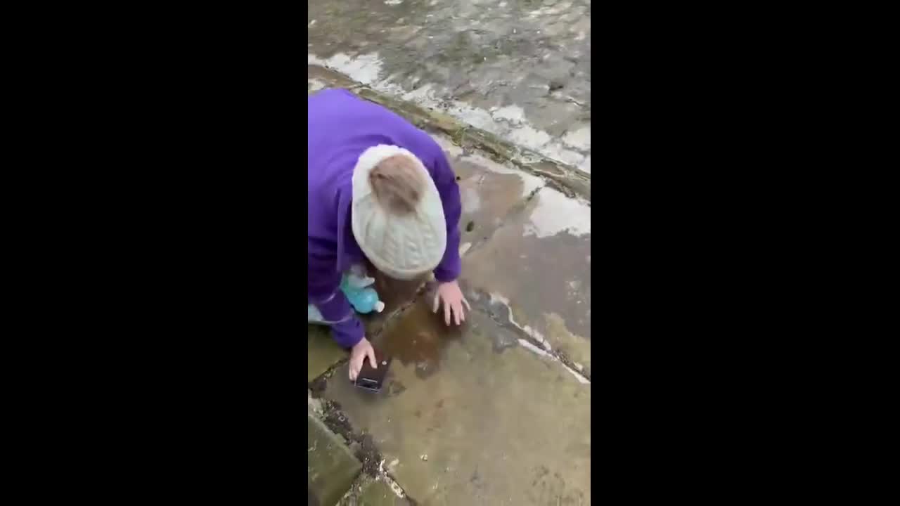 Ice-cold determination on an icy street in Halifax, West Yorkshire, UK