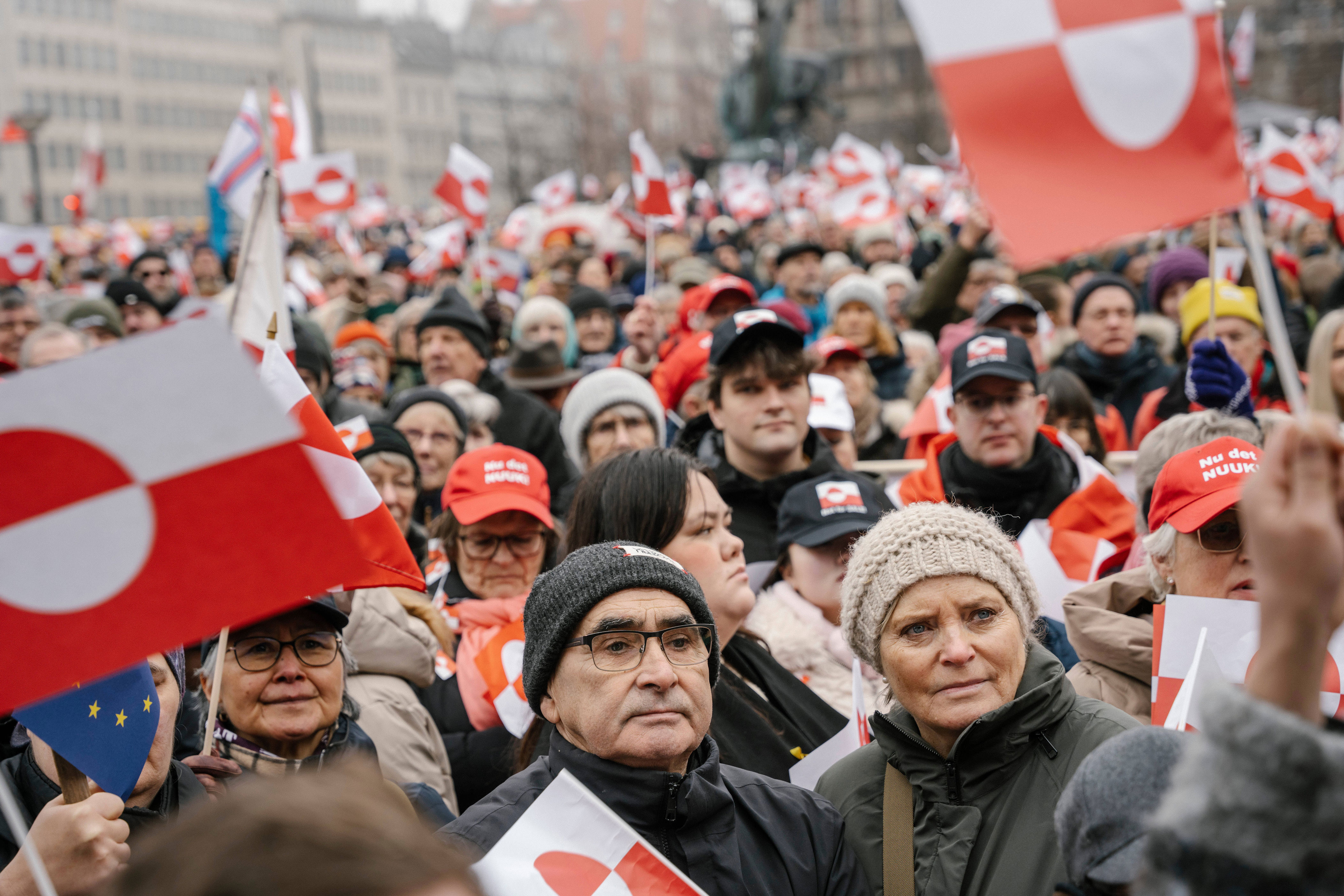Greenland protesters mock Trump with their own red cap slogan