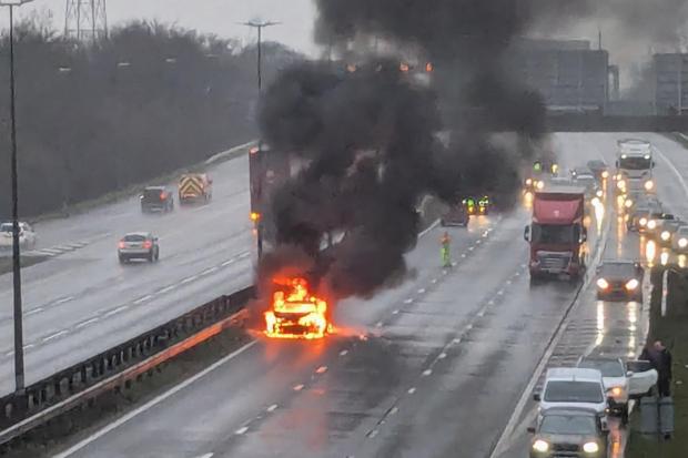 Footage shows car engulfed by flames after crash which closed M62 for ...
