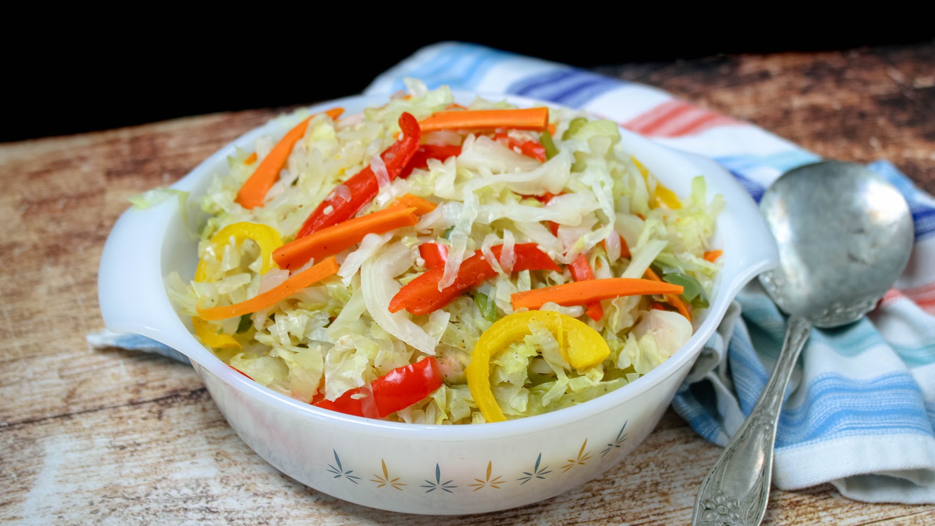 Onions and peppers add tons of flavor to this cabbage side dish ...