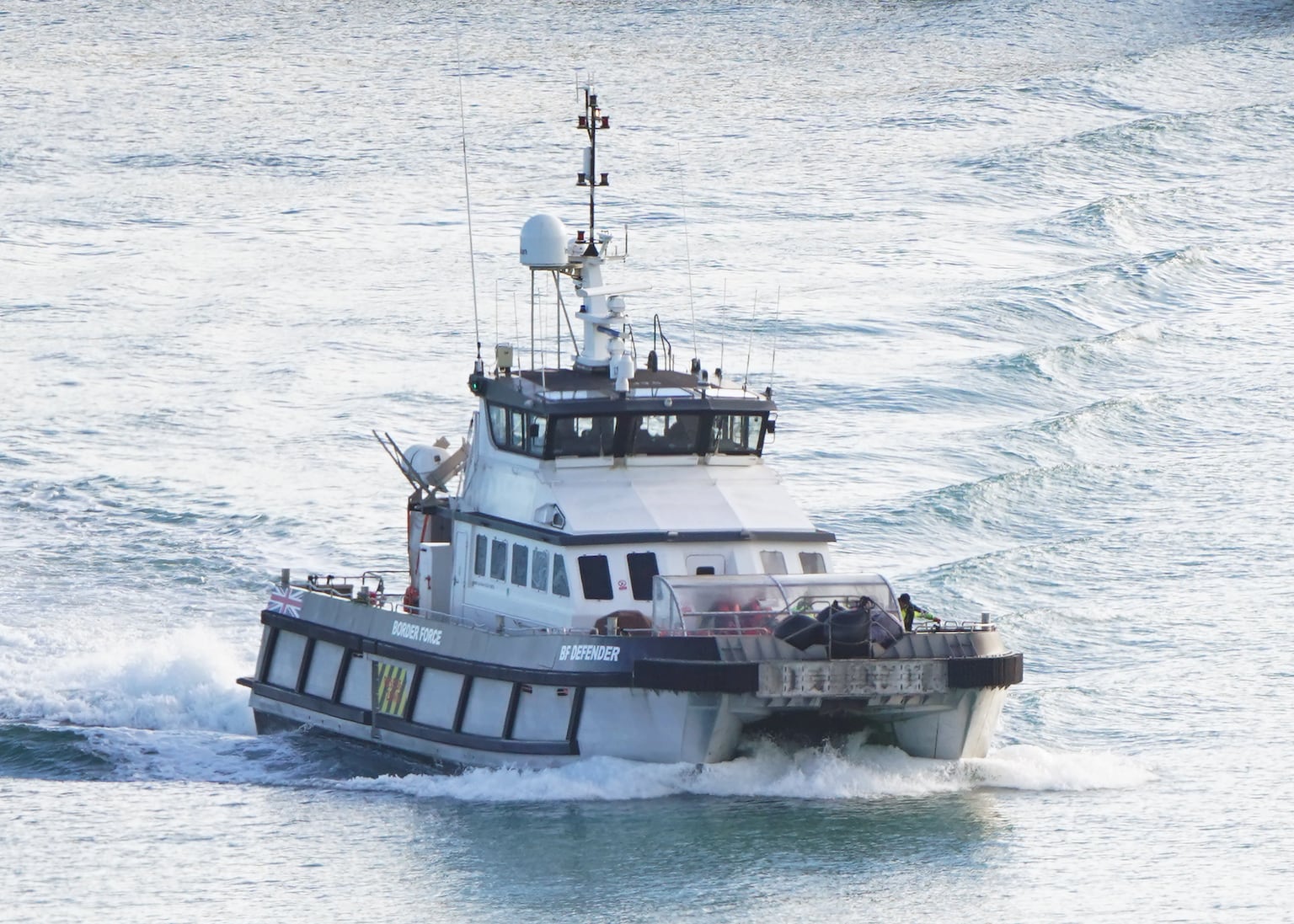 Migrants arrive in UK wearing blankets after crossing English Channel