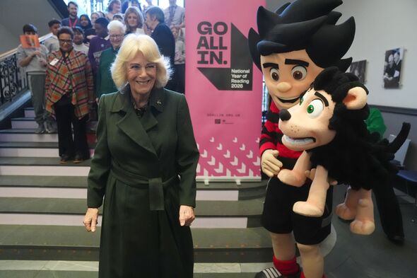 Queen Camilla meets iconic Beano characters Dennis the Menace and Gnasher
