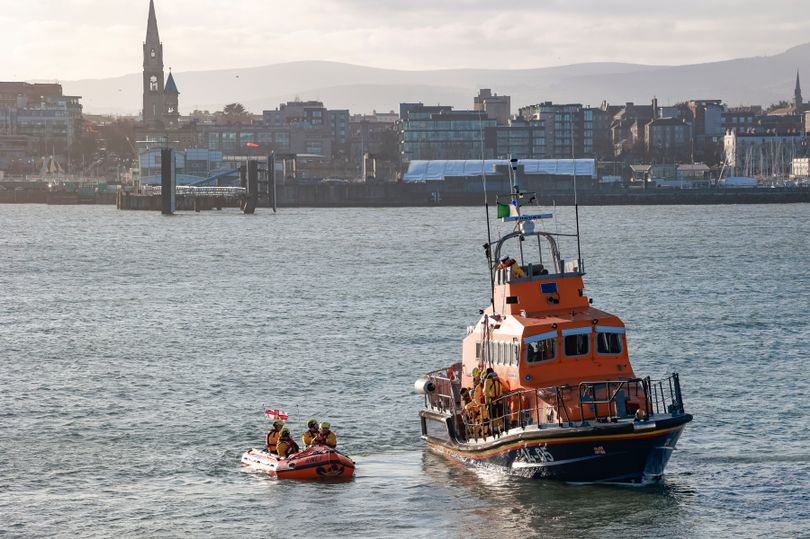 Lifeboat crew rescues three people after jet ski crashes into pier in ...