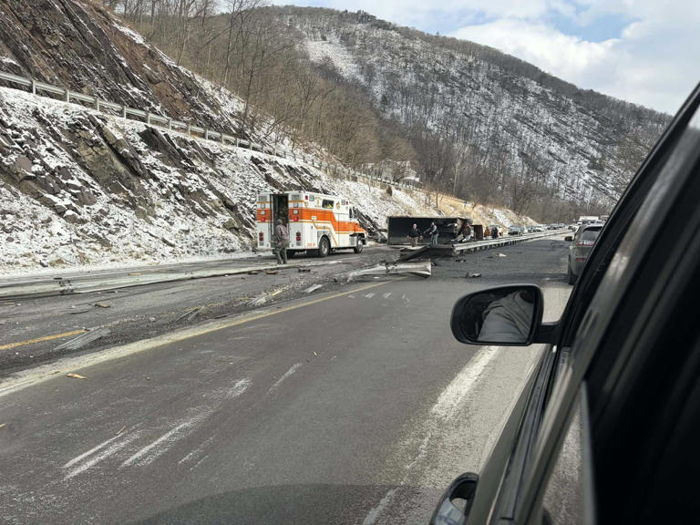 Dump truck flips over | Photos