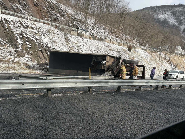 Dump truck flips over | Photos