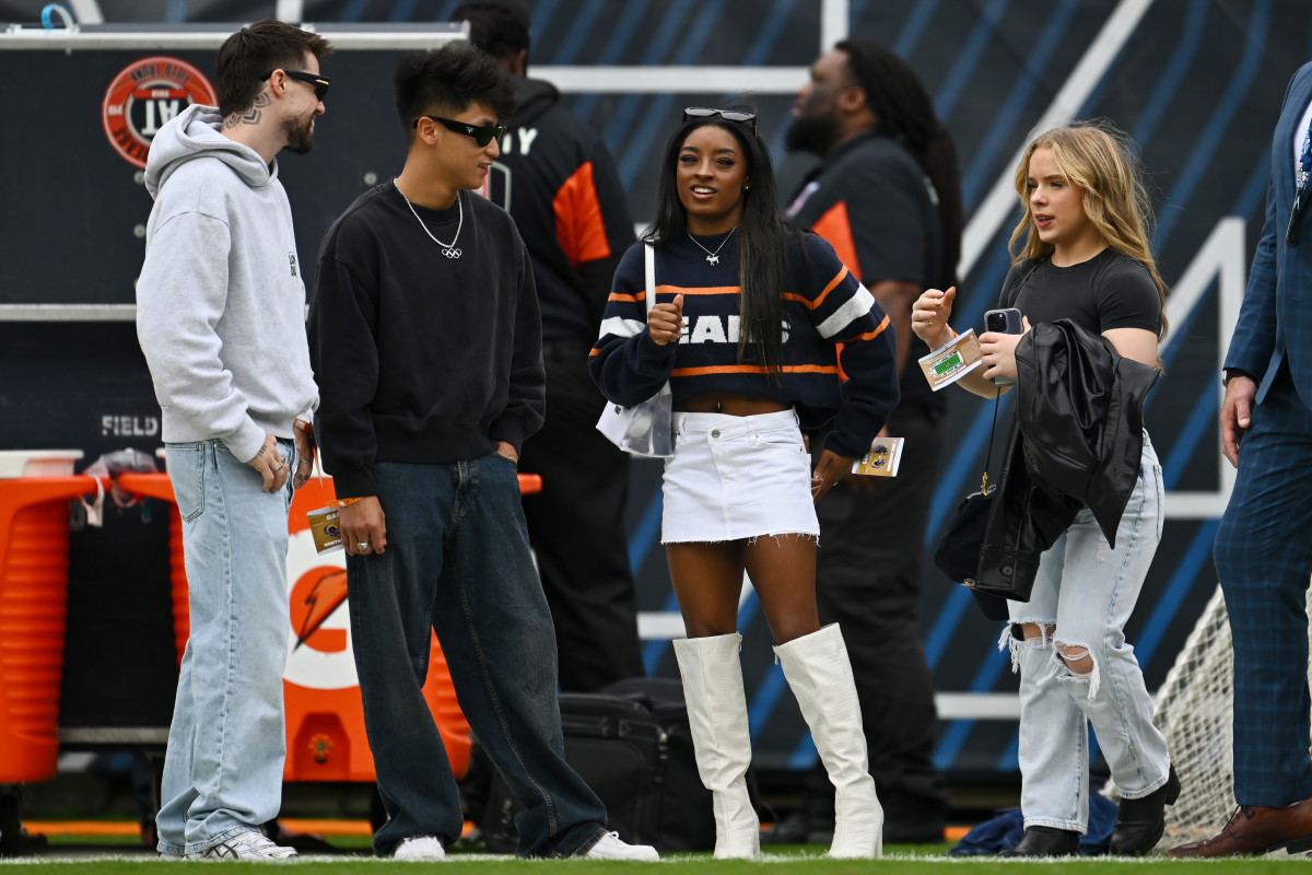 Simone Biles wore customized coat for husband's NFL playoff game