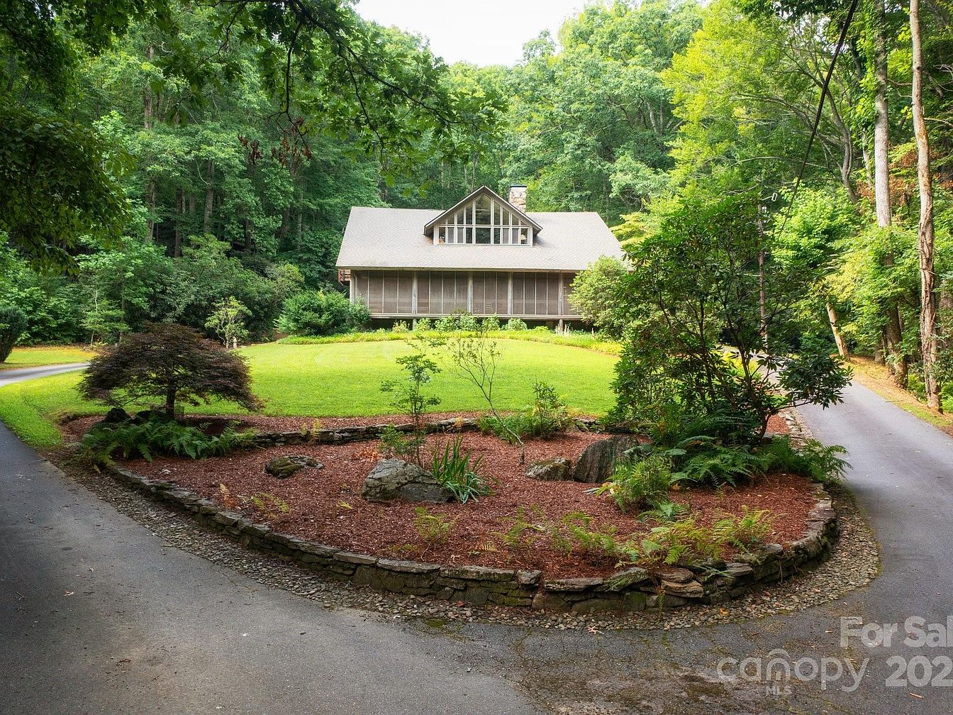Historic 1915 log home in Arden, North Carolina, featuring 26 acres, a ...