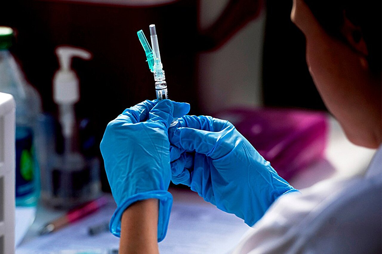 Federal officials scale back childhood vaccination schedule in historic ...