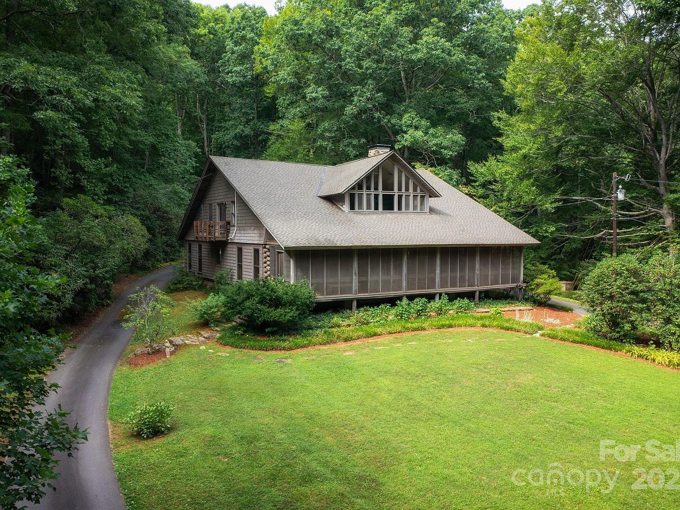 Historic 1915 log home in Arden, North Carolina, featuring 26 acres, a ...