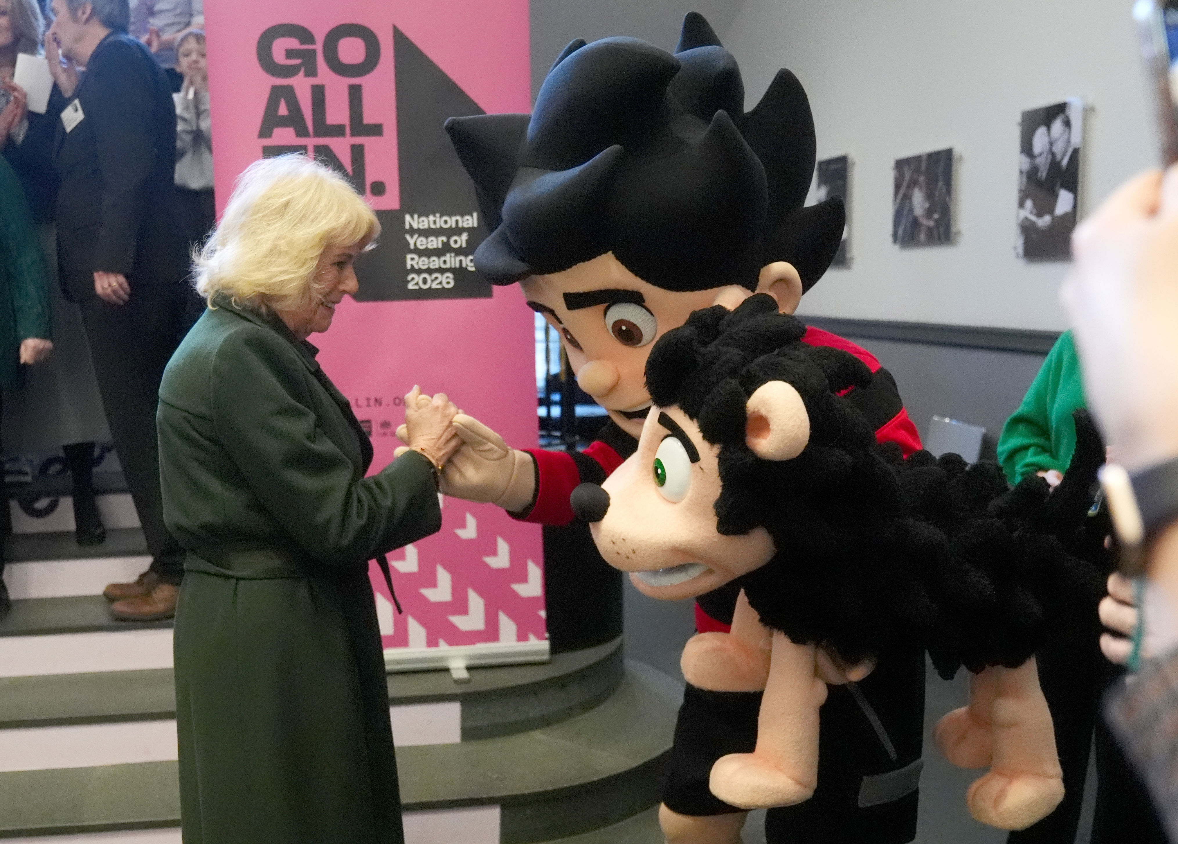 Camilla meets comic book characters during reading initiative launch