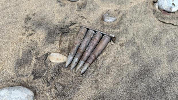 'Rare' find as wartime bullets discovered on island beach