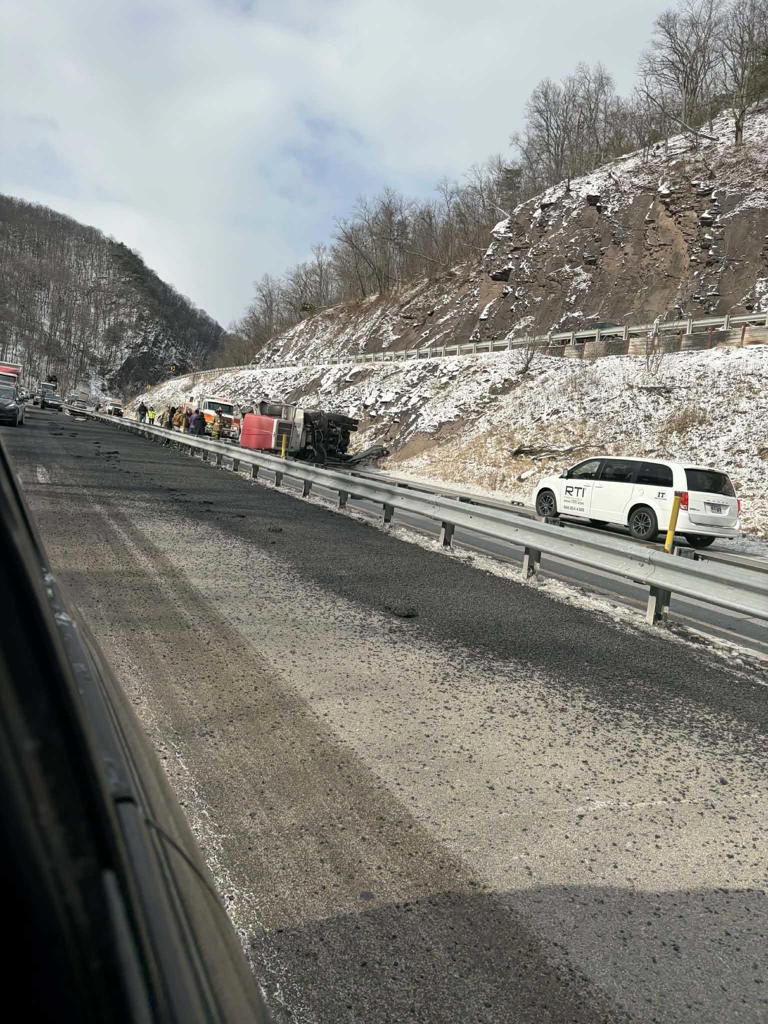 Dump truck carrying stones flips over | Photos