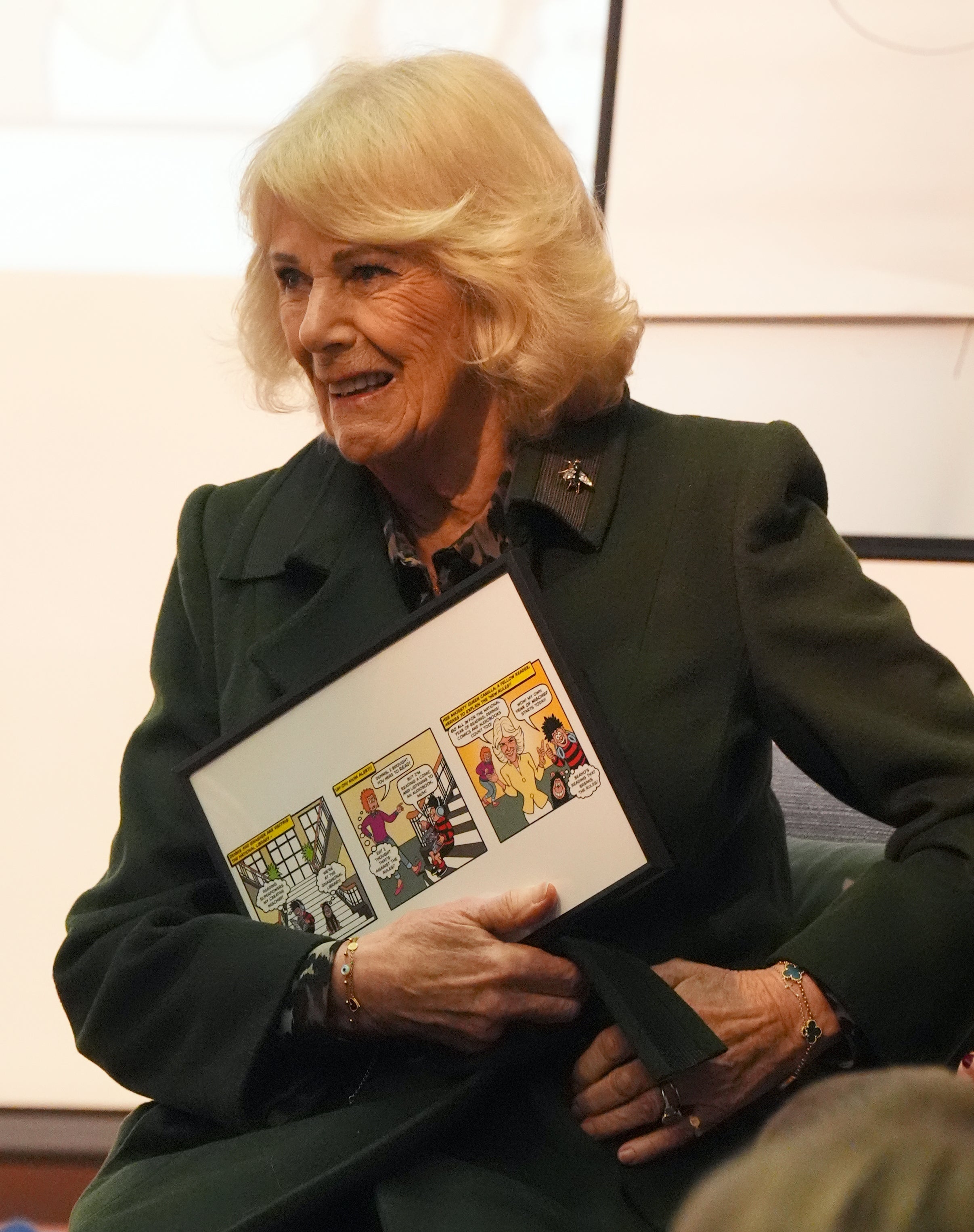 Queen joined by comic book characters as she launches reading scheme
