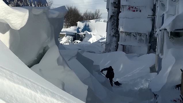 Heaviest snowfall in 60 years blocks buildings in Russia's Kamchatka