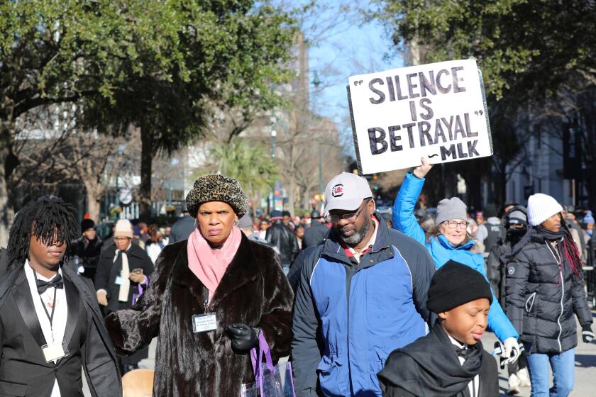 Political climate spurs efforts to 'reclaim' MLK holiday