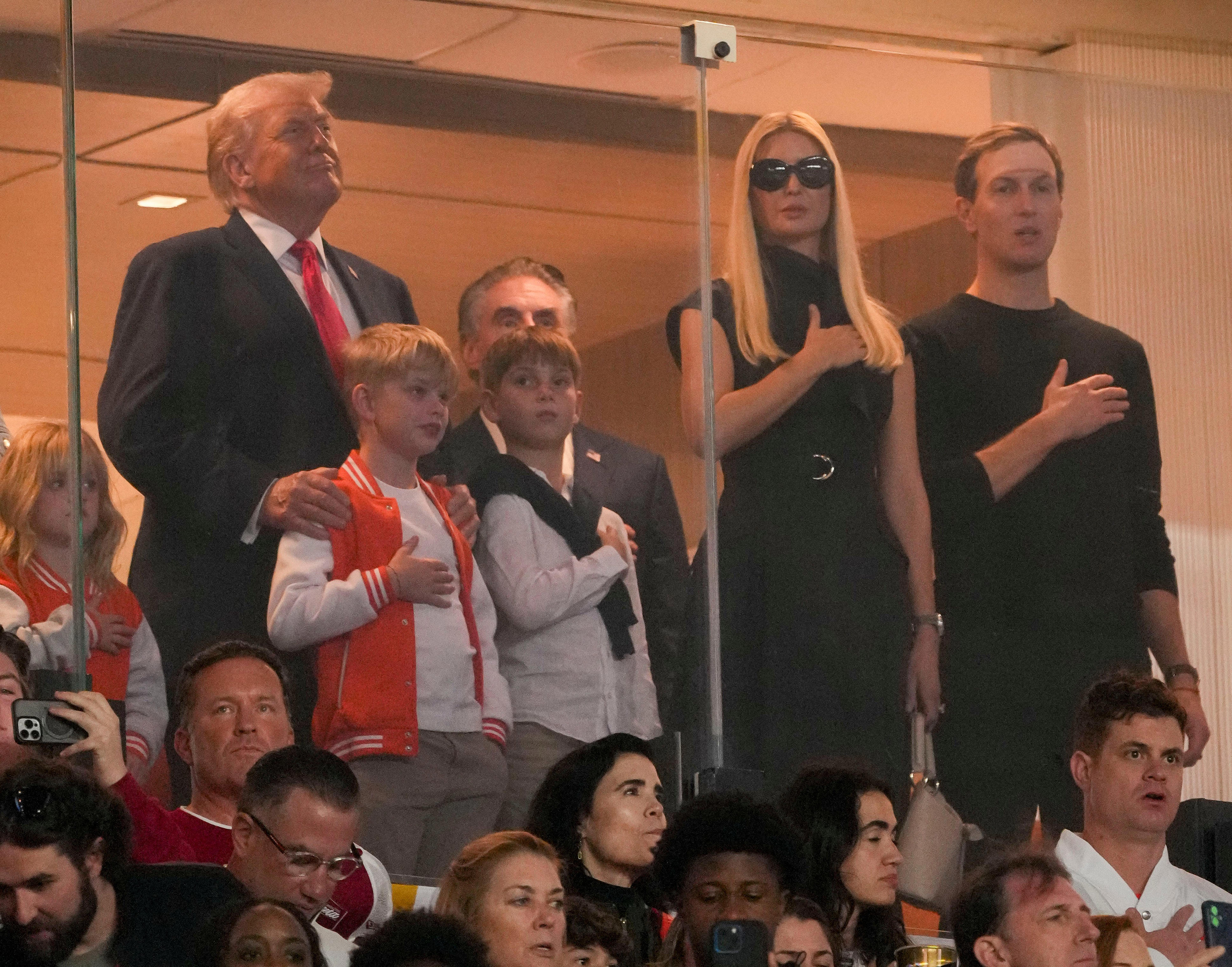 President Trump gets cheers, boos at Indiana-Miami championship game