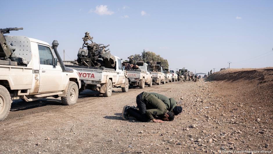 IS fighters flee prison as Syria's army clashes with SDF