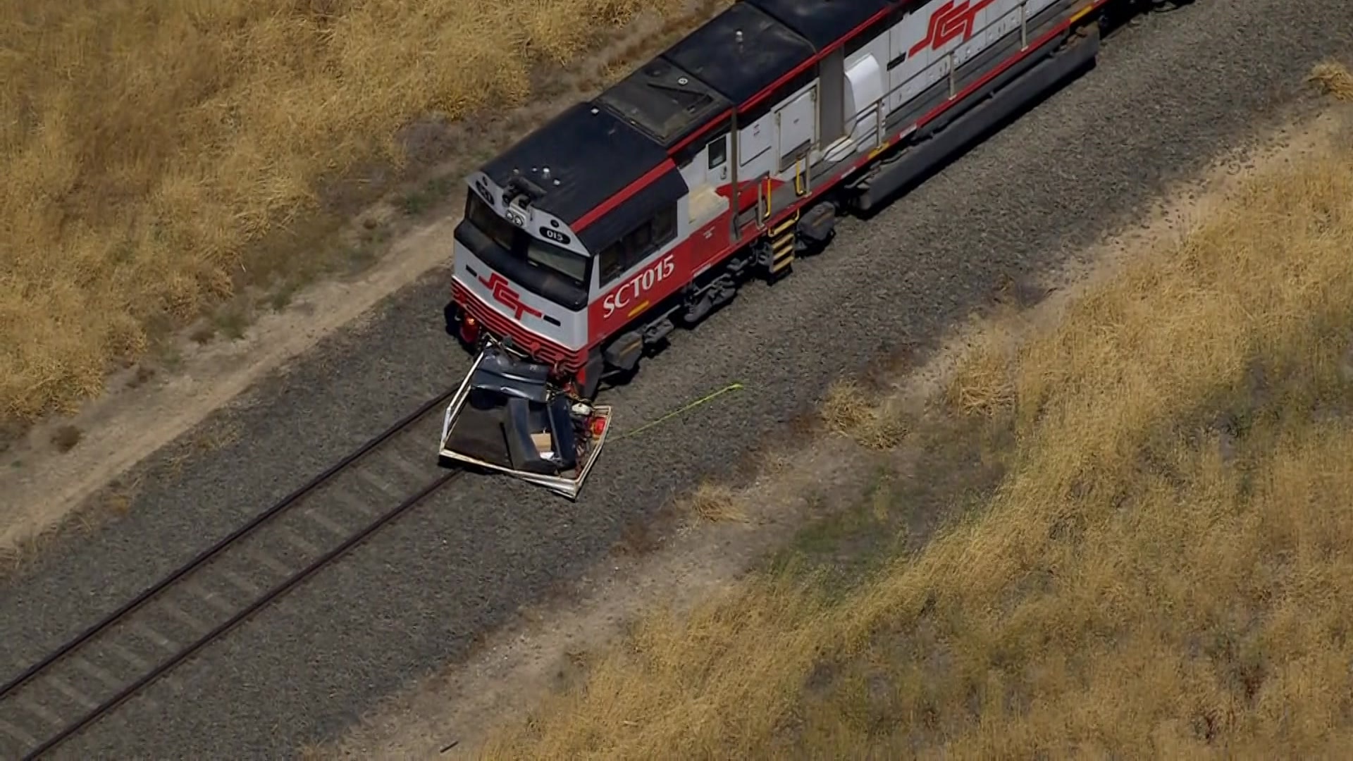 Two dead after car and freight train collide at Cressy, west of Geelong