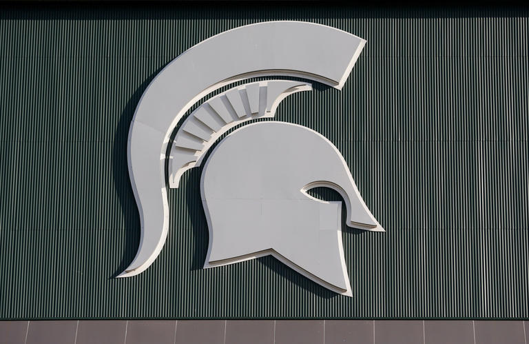 Former Michigan State player and director of hockey operations Dan ...