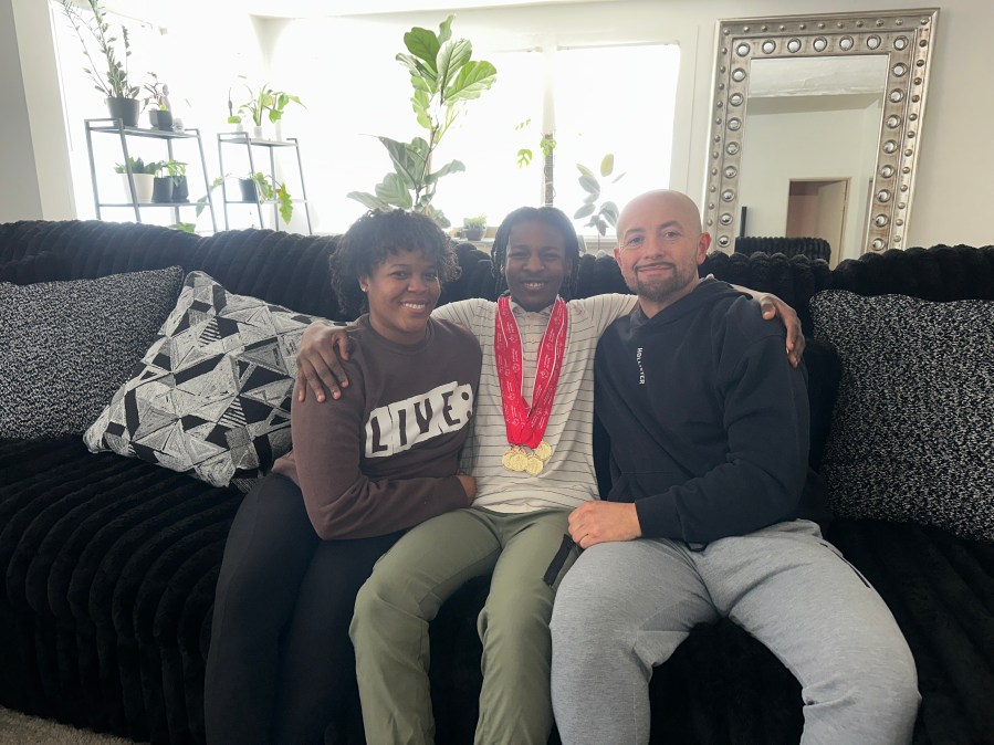 Big shot: Unified basketball player effortlessly sinks 3-pointer