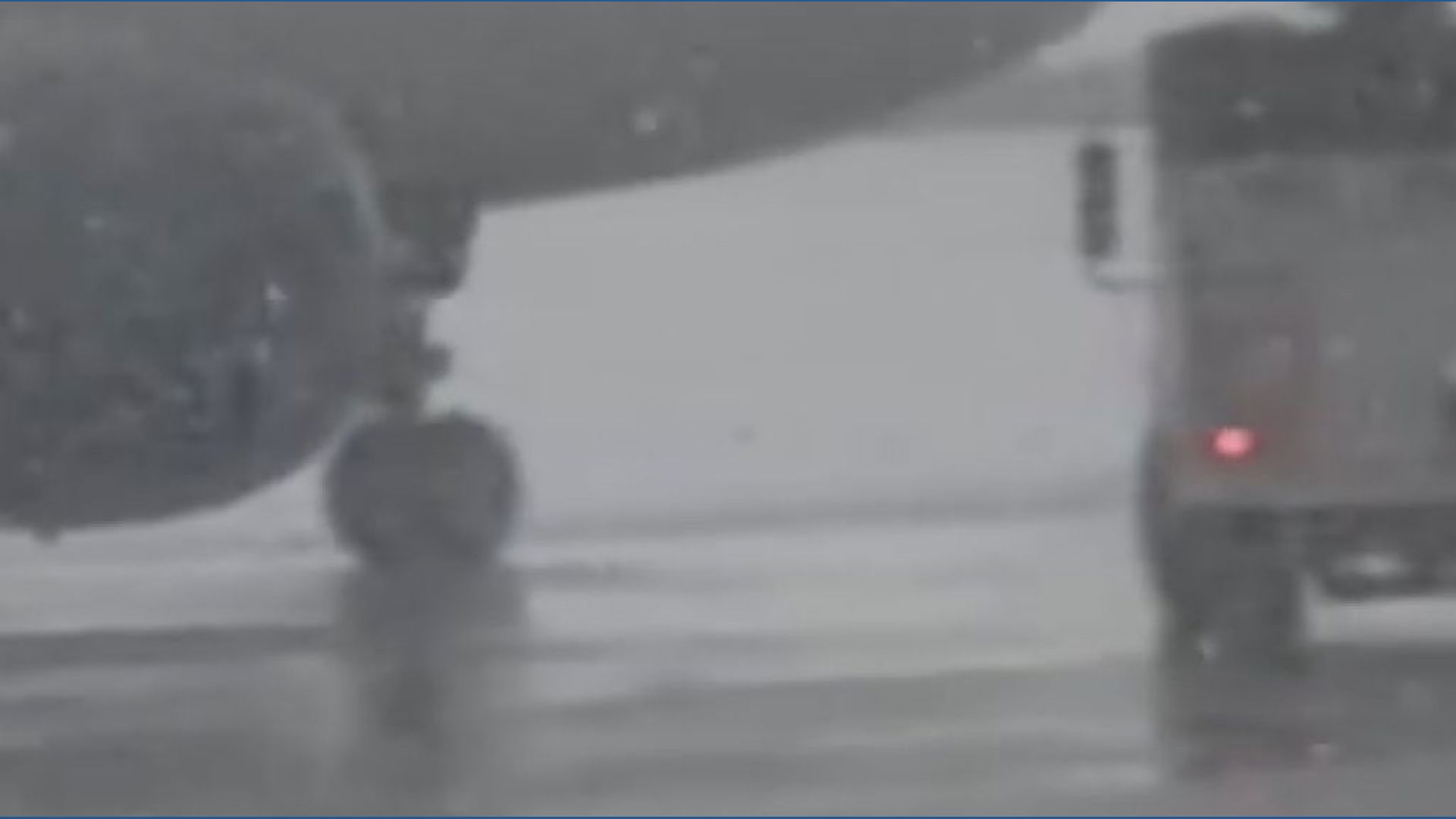Plane deicing at Rochester Airport during whiteout conditions in New York