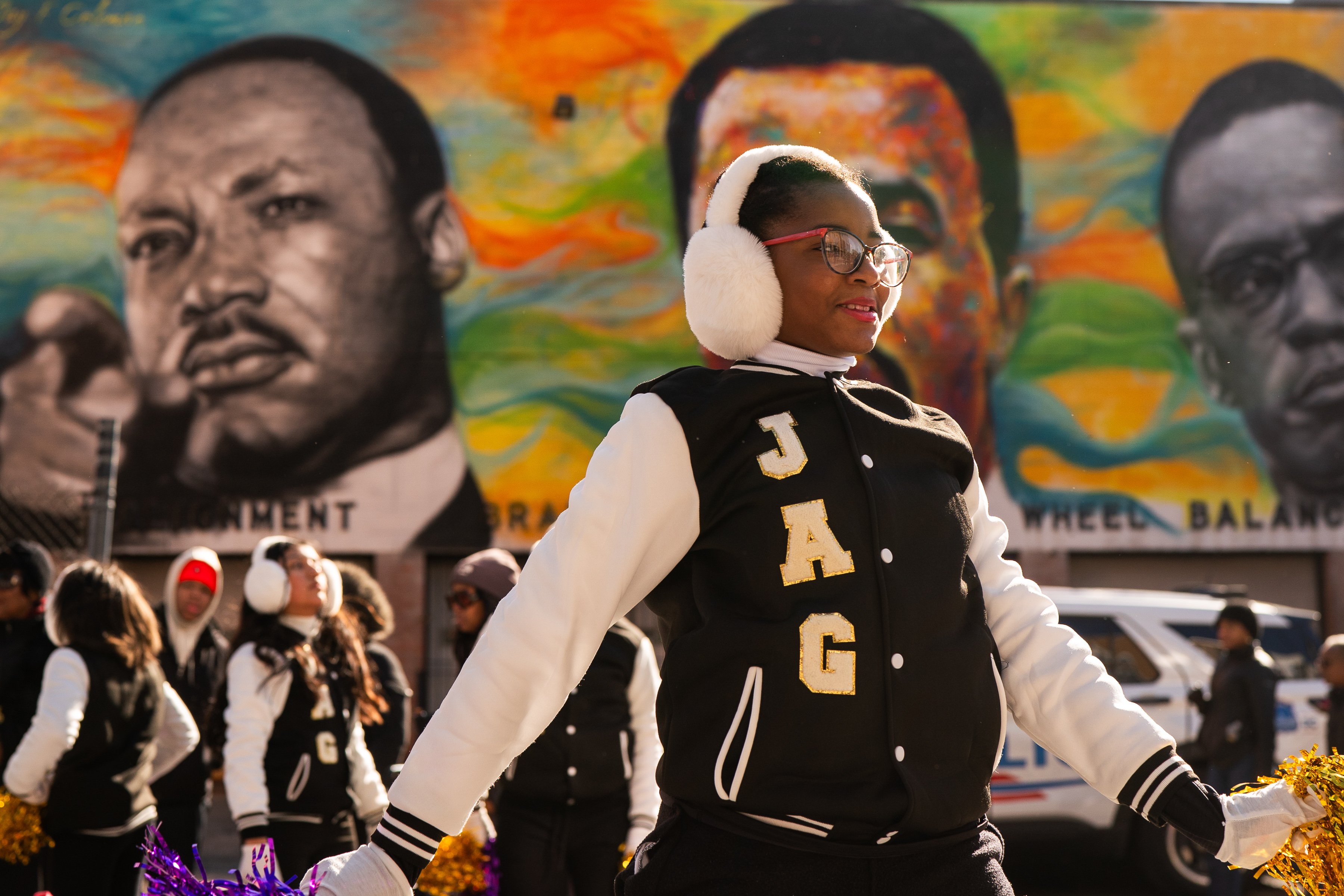 Hundreds march to celebrate MLK — and protest Trump