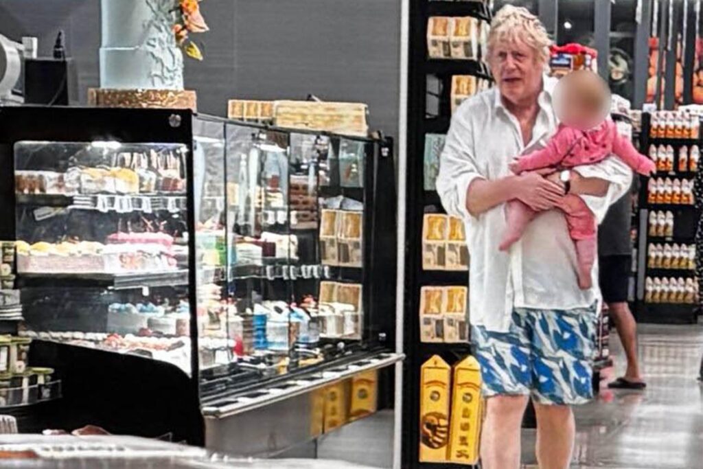 Boris Johnson spotted in luxurious Cayman Islands with messy hair and ...
