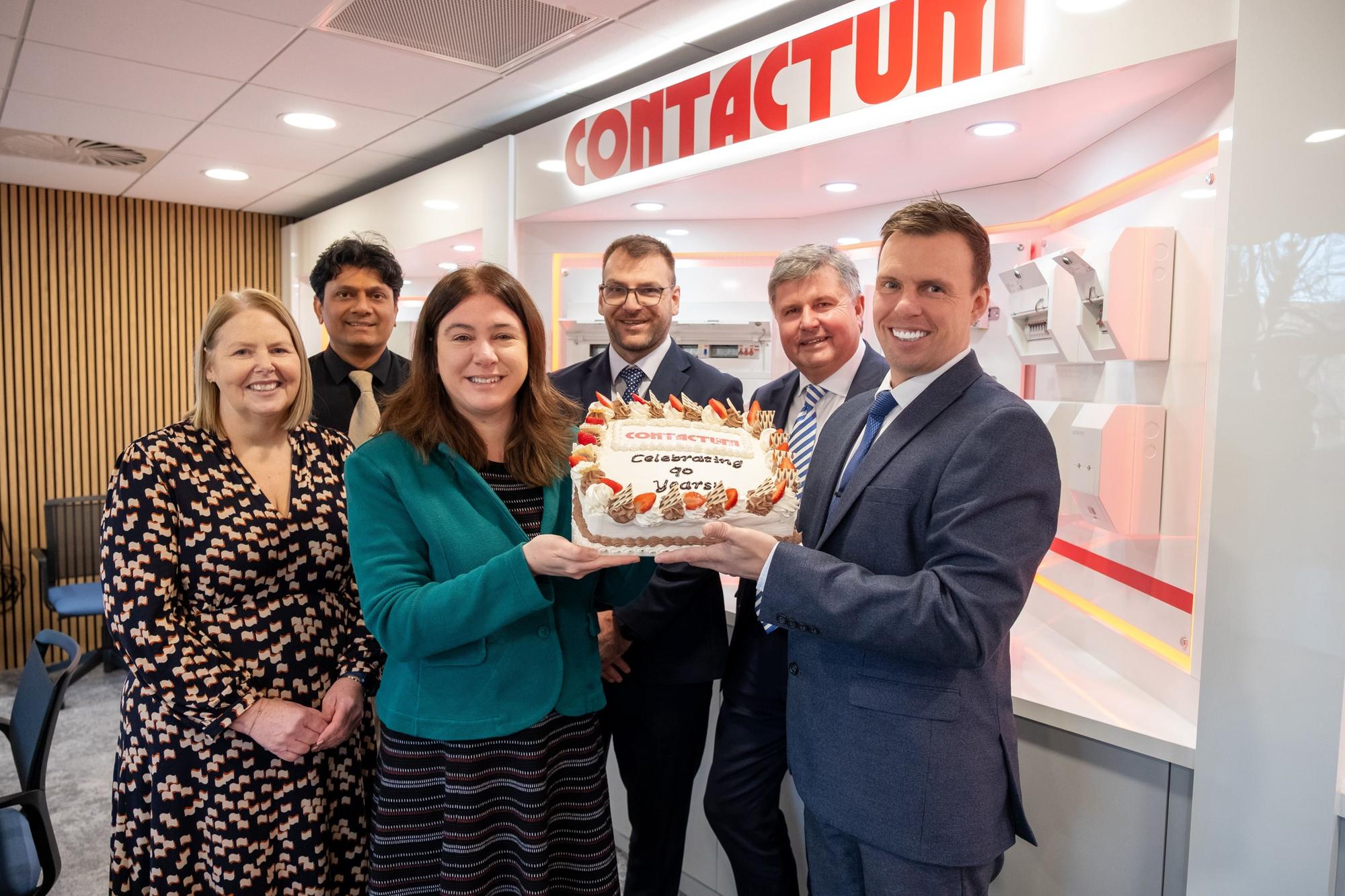 Dunstable MP cuts cake as Contactum turns 90