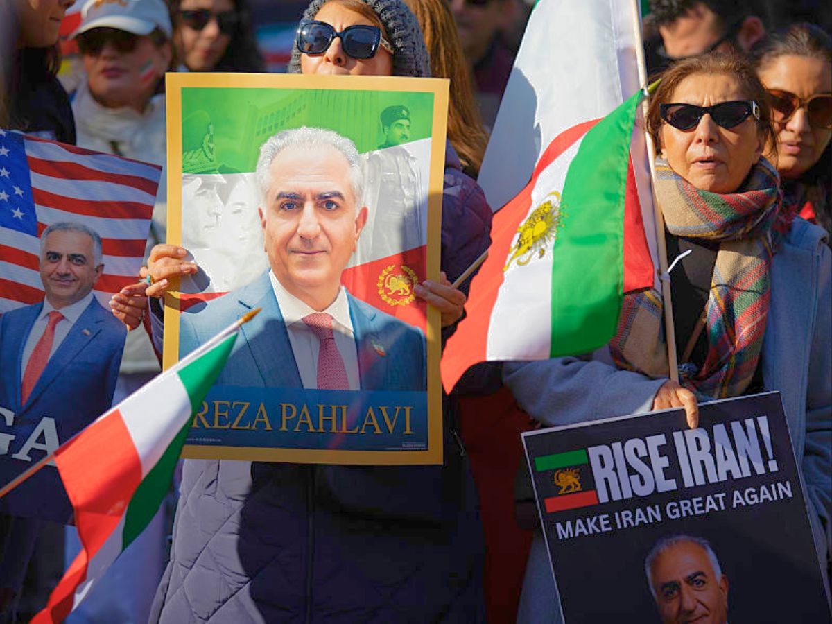 'Don't point your weapons at the people': Iran state TV hacked during ...