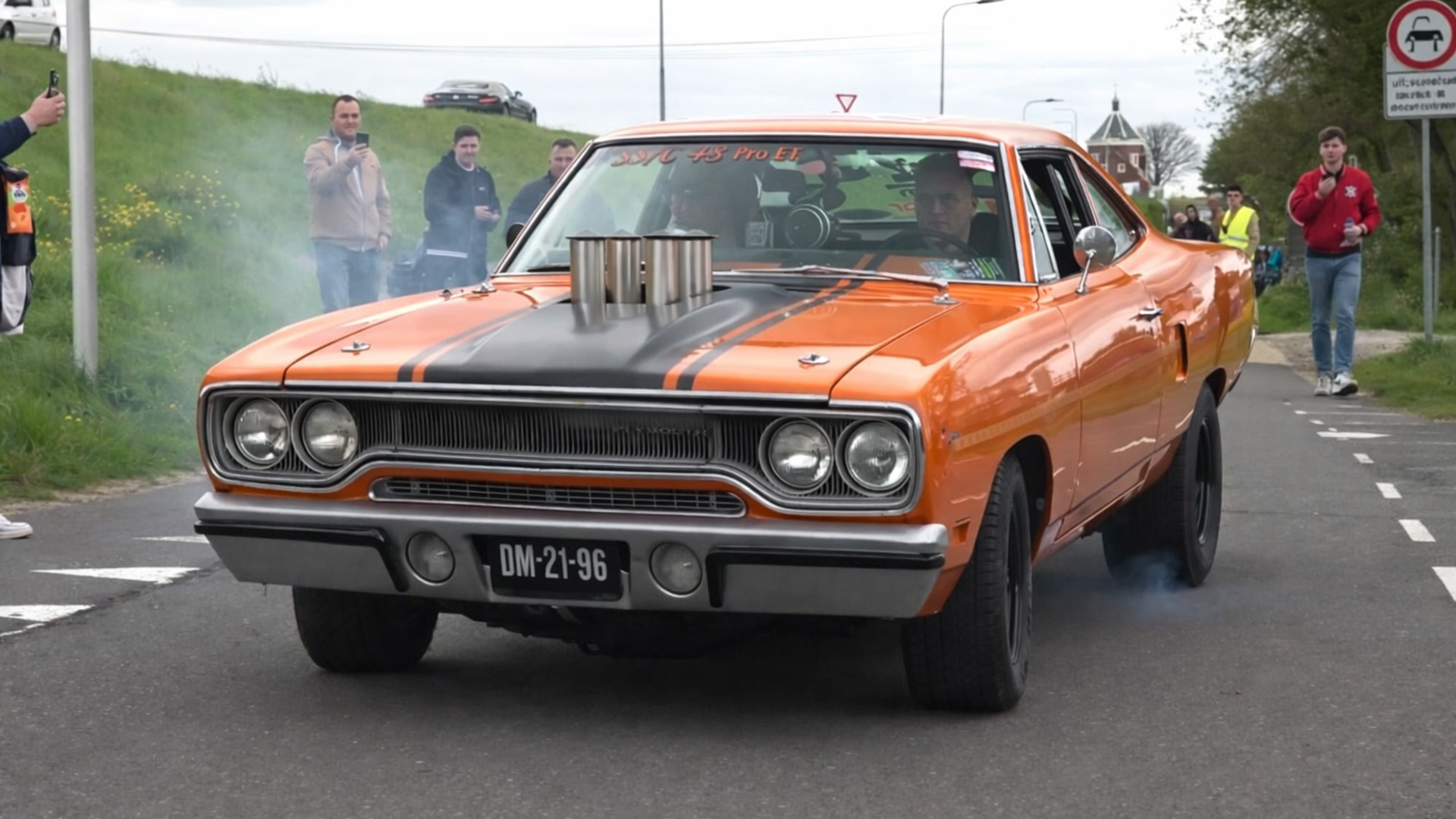 Performance cars demonstrate rapid acceleration on the road