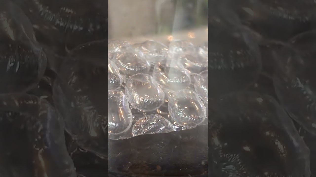 Bubble wrap inside a vacuum chamber