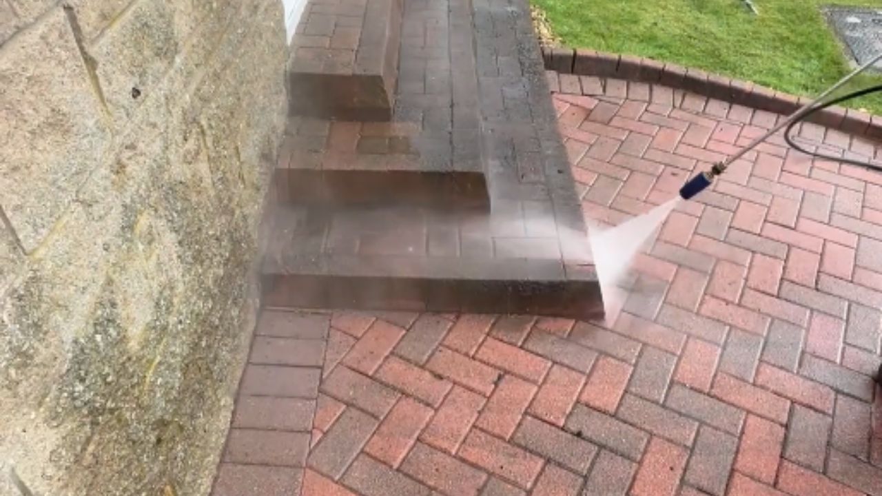 Layers of dirt disappear as grimy steps get a satisfying power wash
