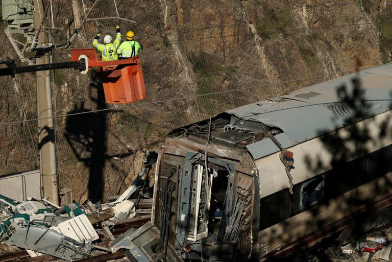 Spain deploys heavy machinery to find missing bodies among train crash ...