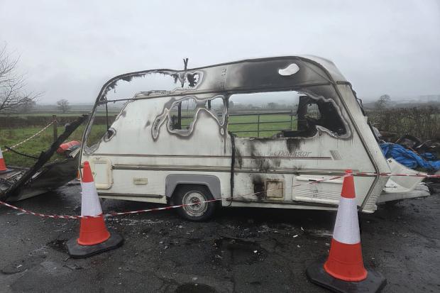Burnt out caravan at side of busy road to be removed today by council