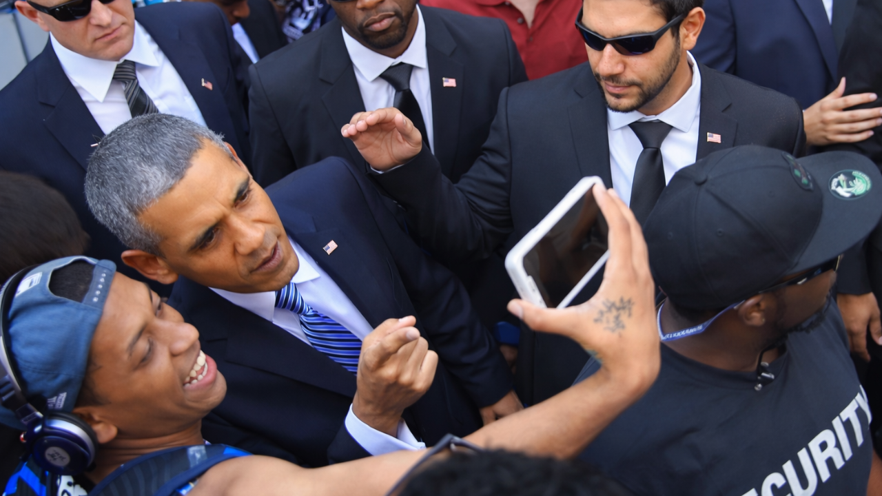 People react to a Barack Obama look-alike in NYC