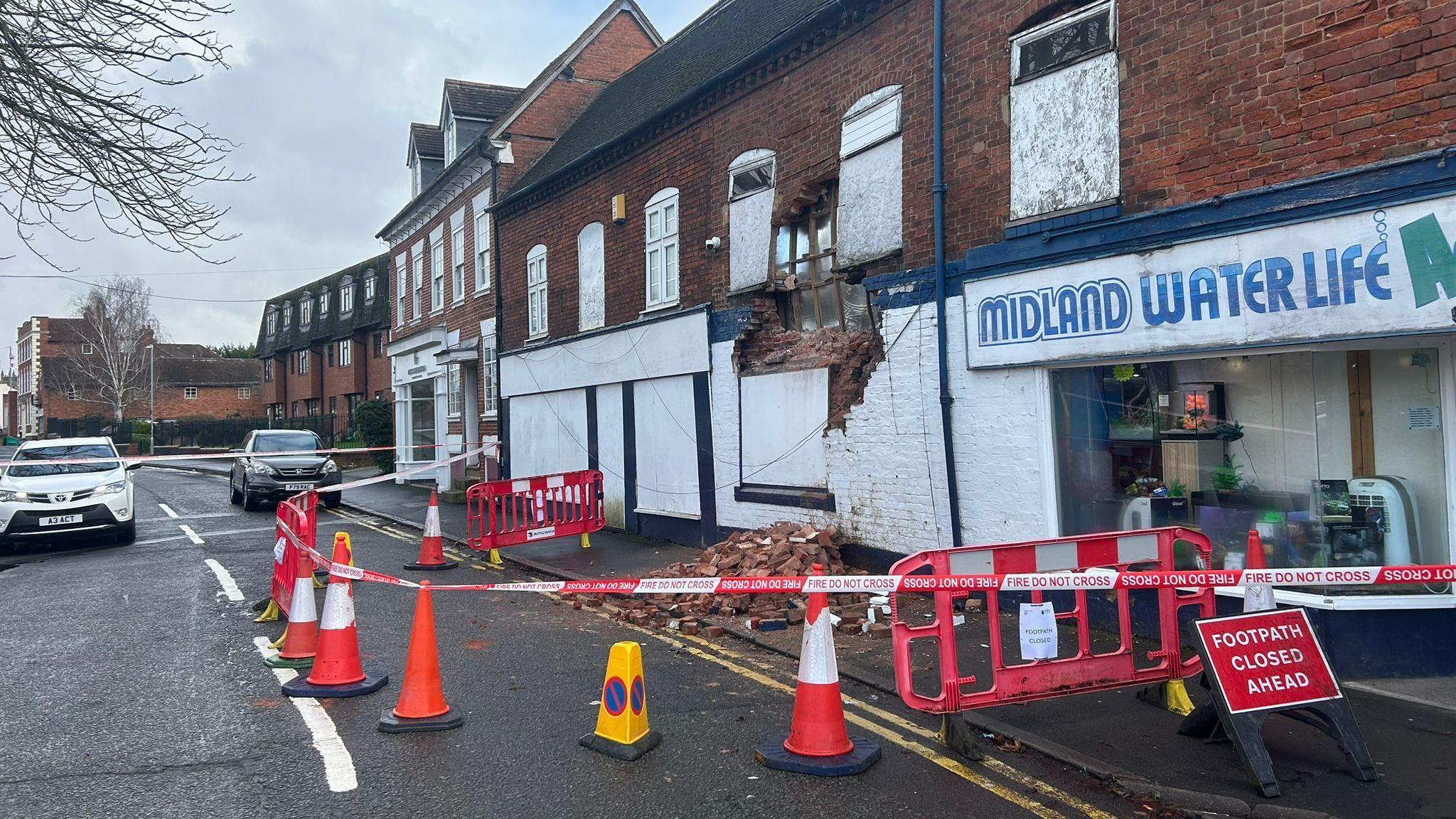 Community shock after building partially collapses