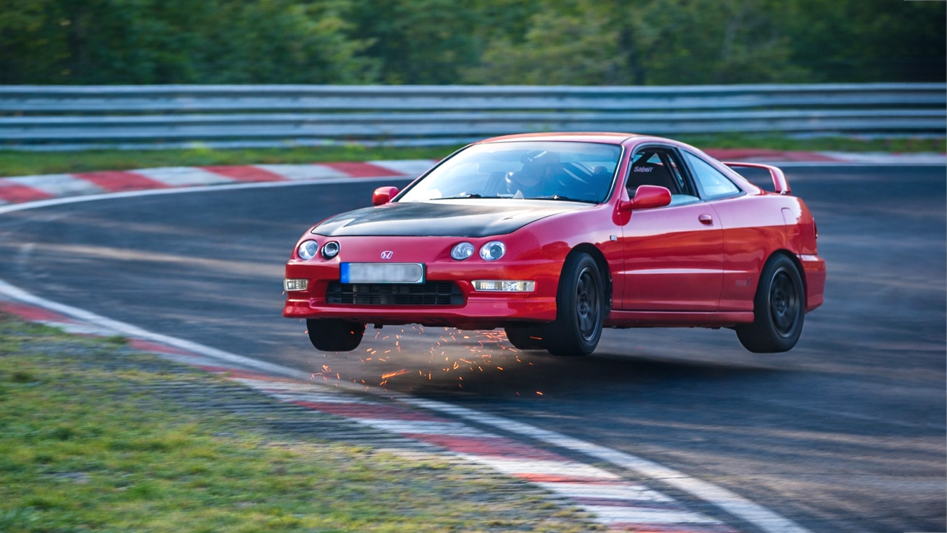 High speed Nürburgring moment car goes airborne over the curb