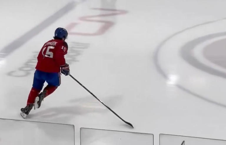 Alex Newhook is back on the ice (in full gear)
