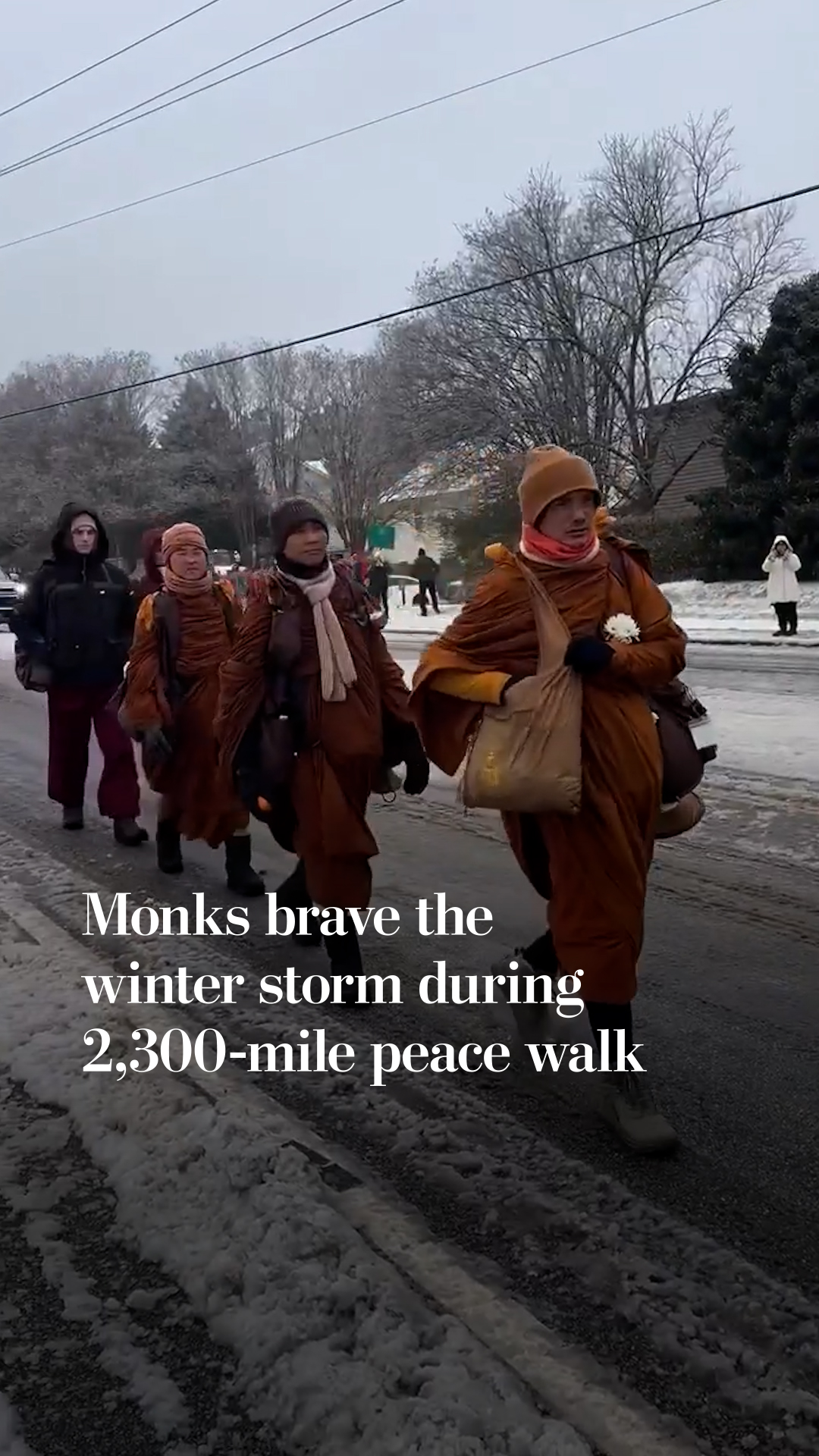 Monks brave the winter storm during 2,300-mile peace walk