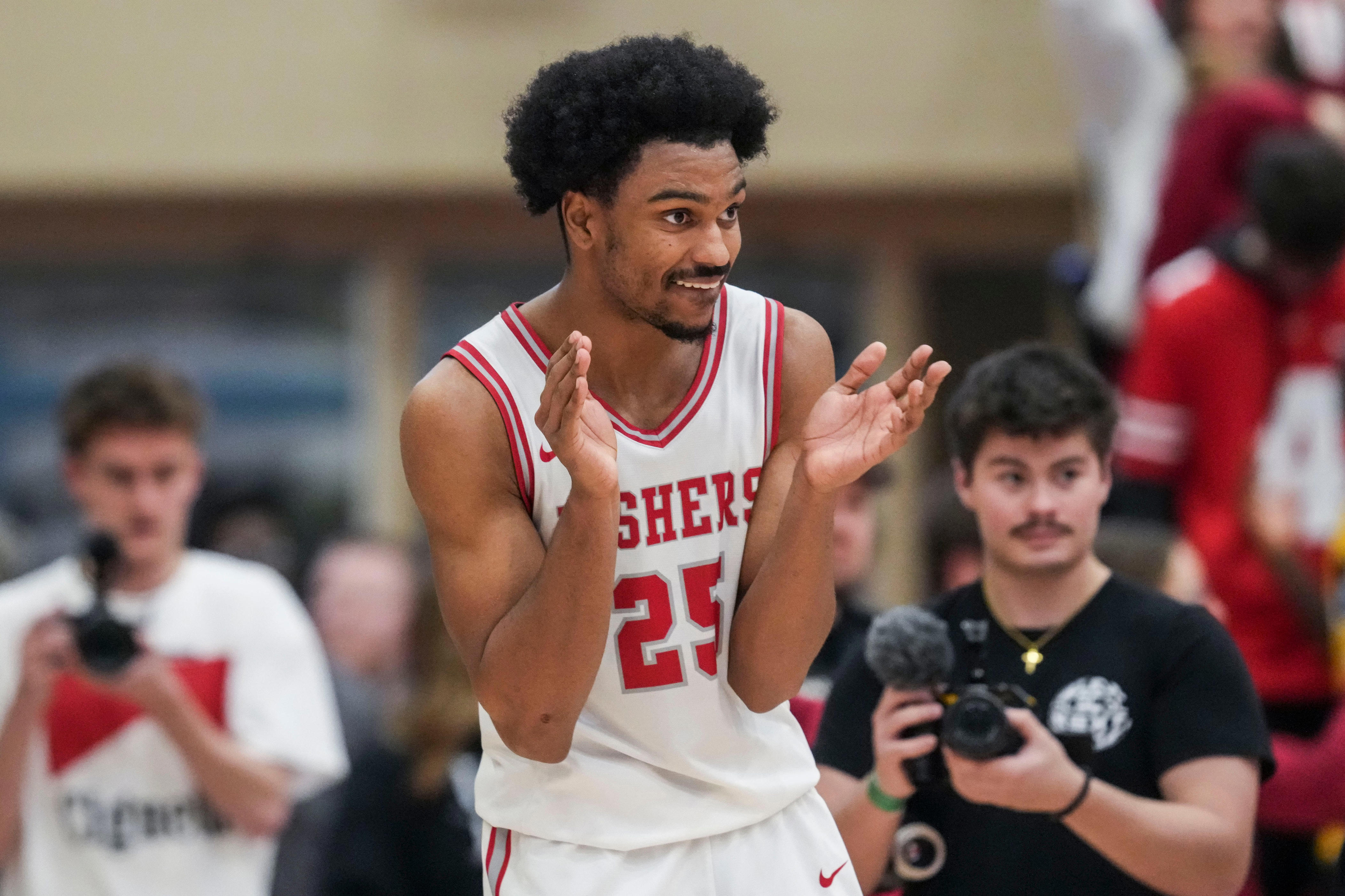 School records, 2,000-point scorers. Vote for basketball player of week