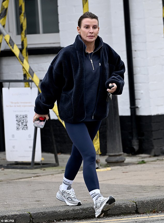 Coleen Rooney looks chic in navy workout gear as she leaves a beauty ...