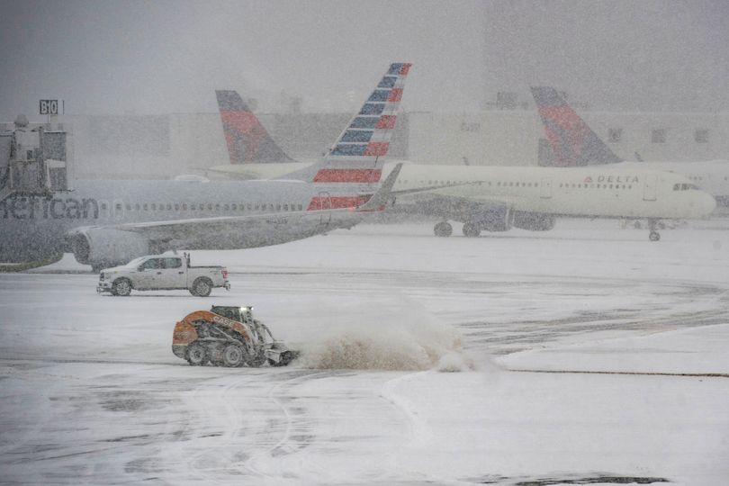 Travel chaos as 14,000 flights canceled in two days as brutal winter ...